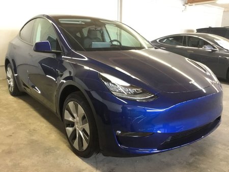TESLA MODEL Y used-2022-tesla-model-y-long-range okazja - parking samochod